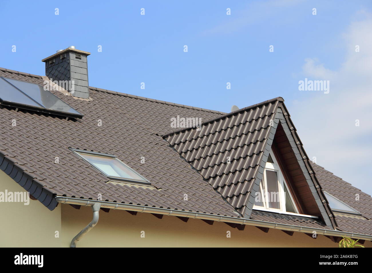 House with roof window Stock Photo - Alamy