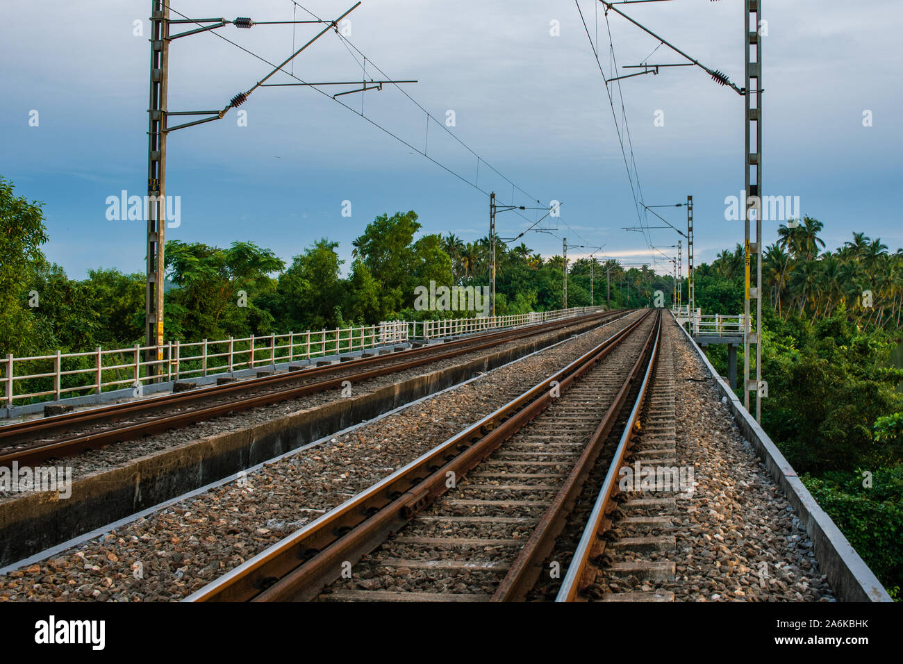 Rail lines stretching into infinity at Edava, Kerala Stock Photo - Alamy