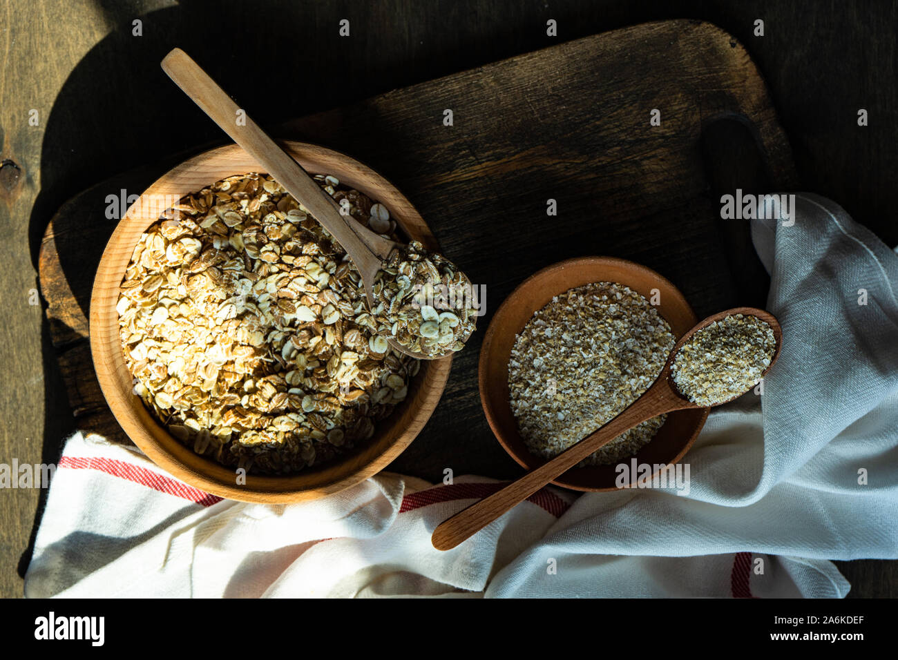 Healthy food concept with oats meal on dark rustic background with ...