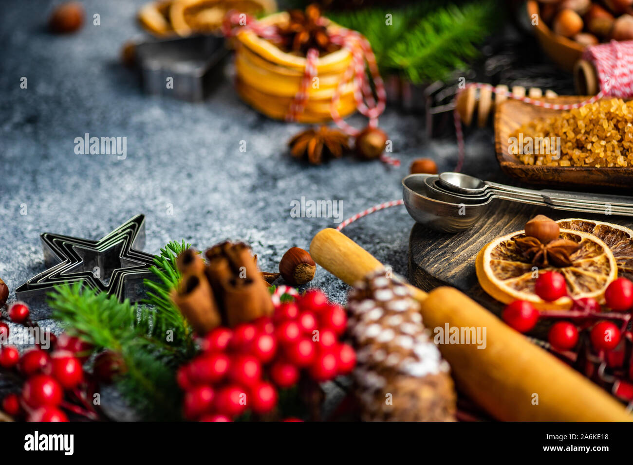 Christmas cooking background with nuts, orange, anise star and cinnamon ...