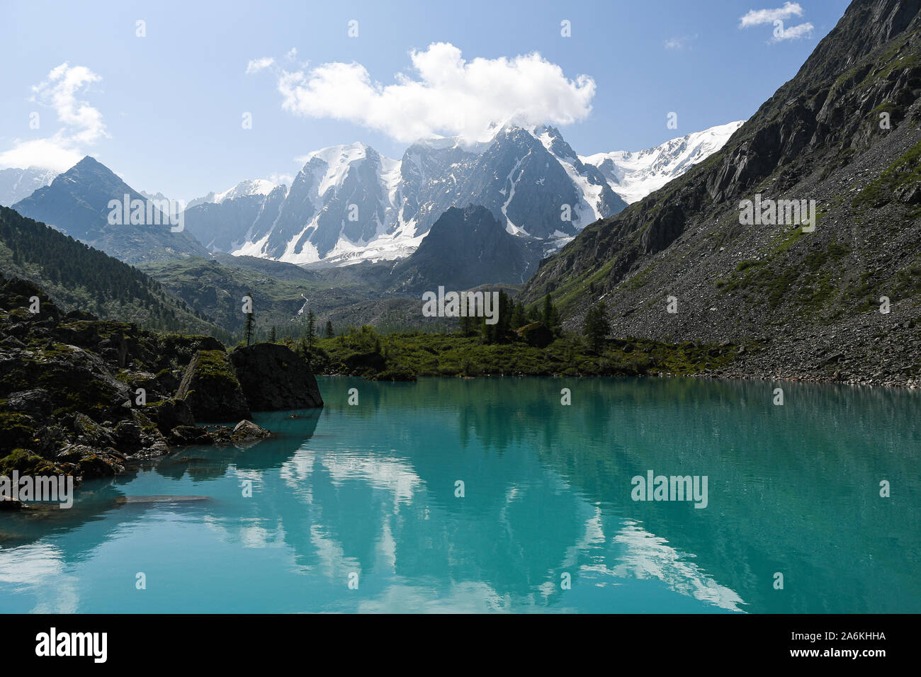 Turquoise lake among rocks. Mountain pond for hiking Stock Photo - Alamy