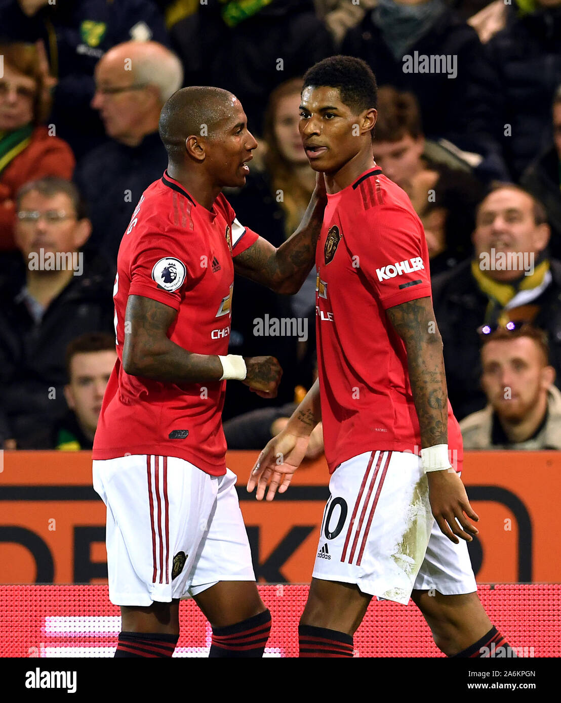 Manchester United's Marcus Rashford (right) celebrates scoring his side ...