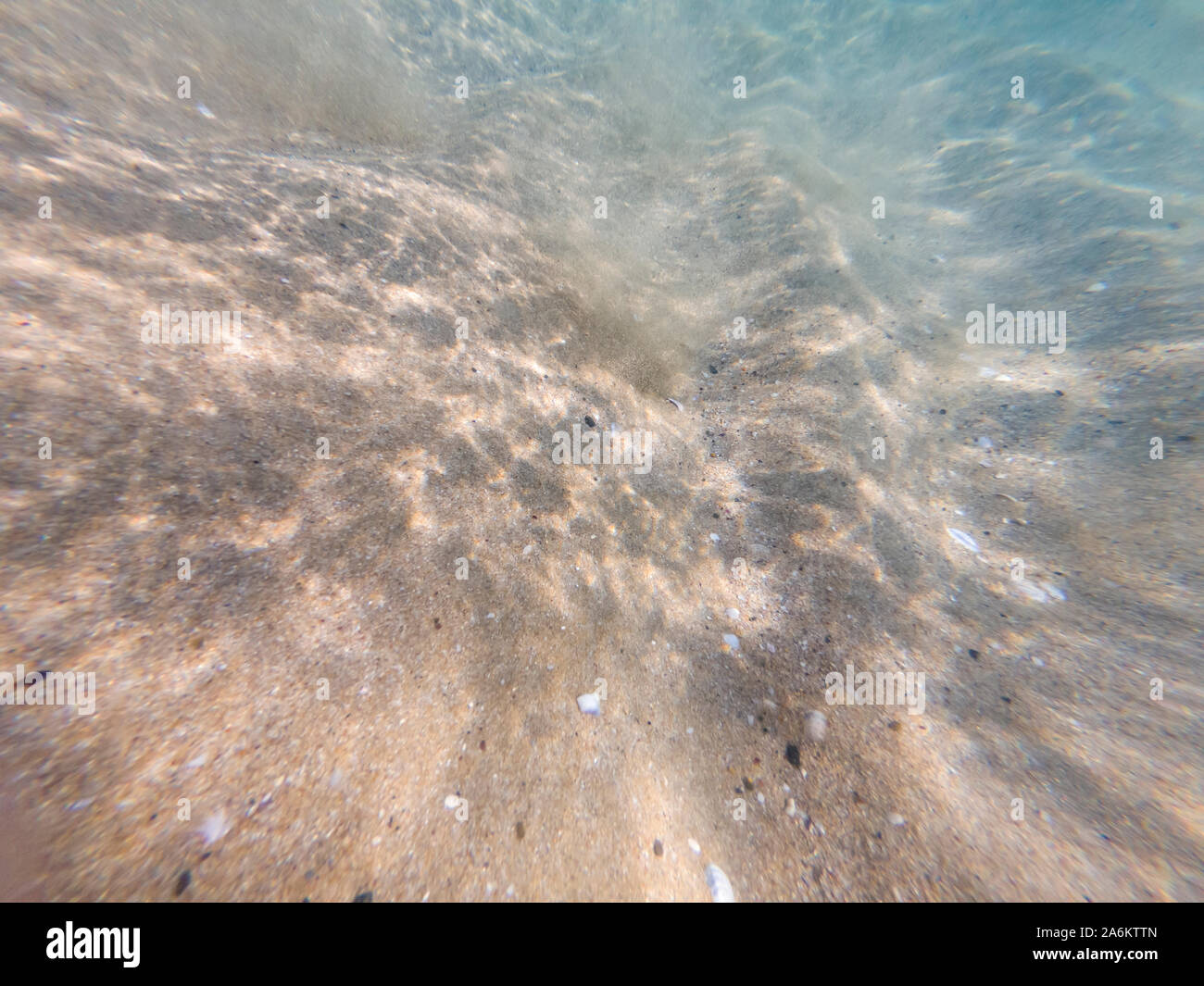 Under water view of sandy sea floor with flowing sand Stock Photo - Alamy