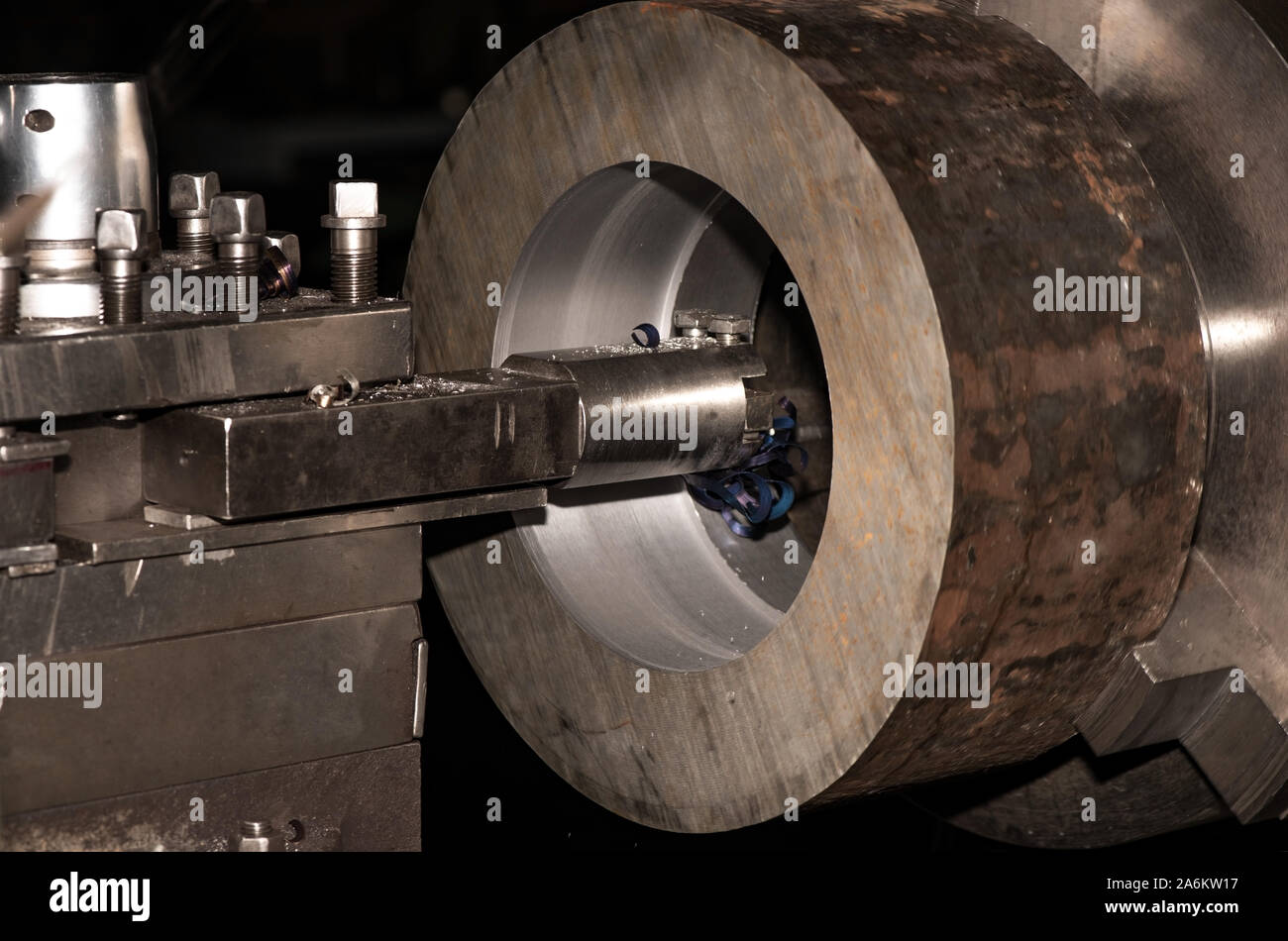 metal turning in a factory Stock Photo - Alamy
