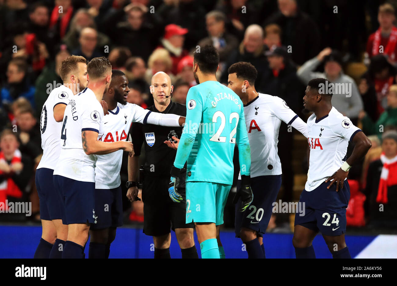 Tottenham hotspur players surround referee anthony taylor hi-res stock ...