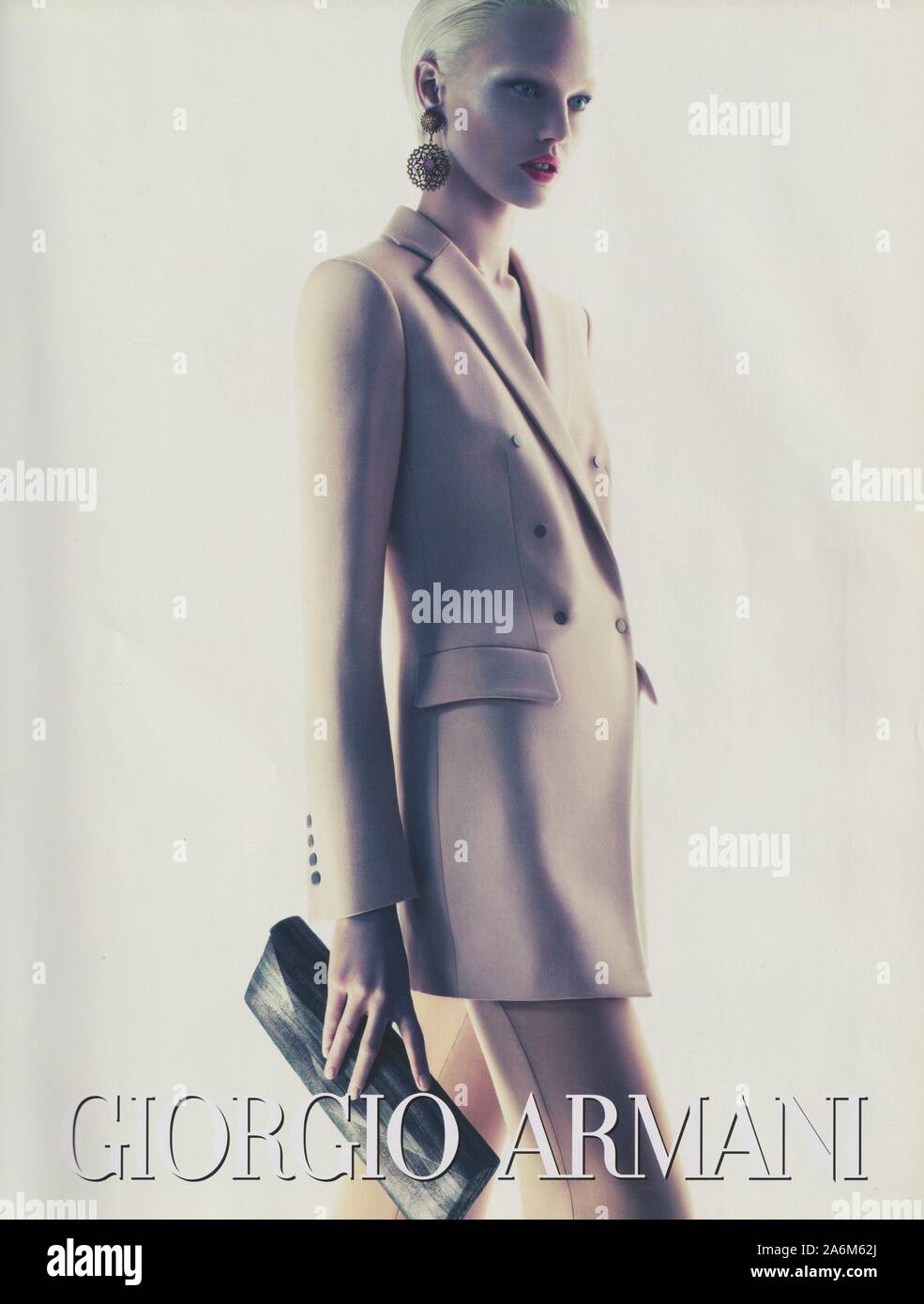 poster advertising Giorgio Armani with Sasha Pivovarova in magazine ...