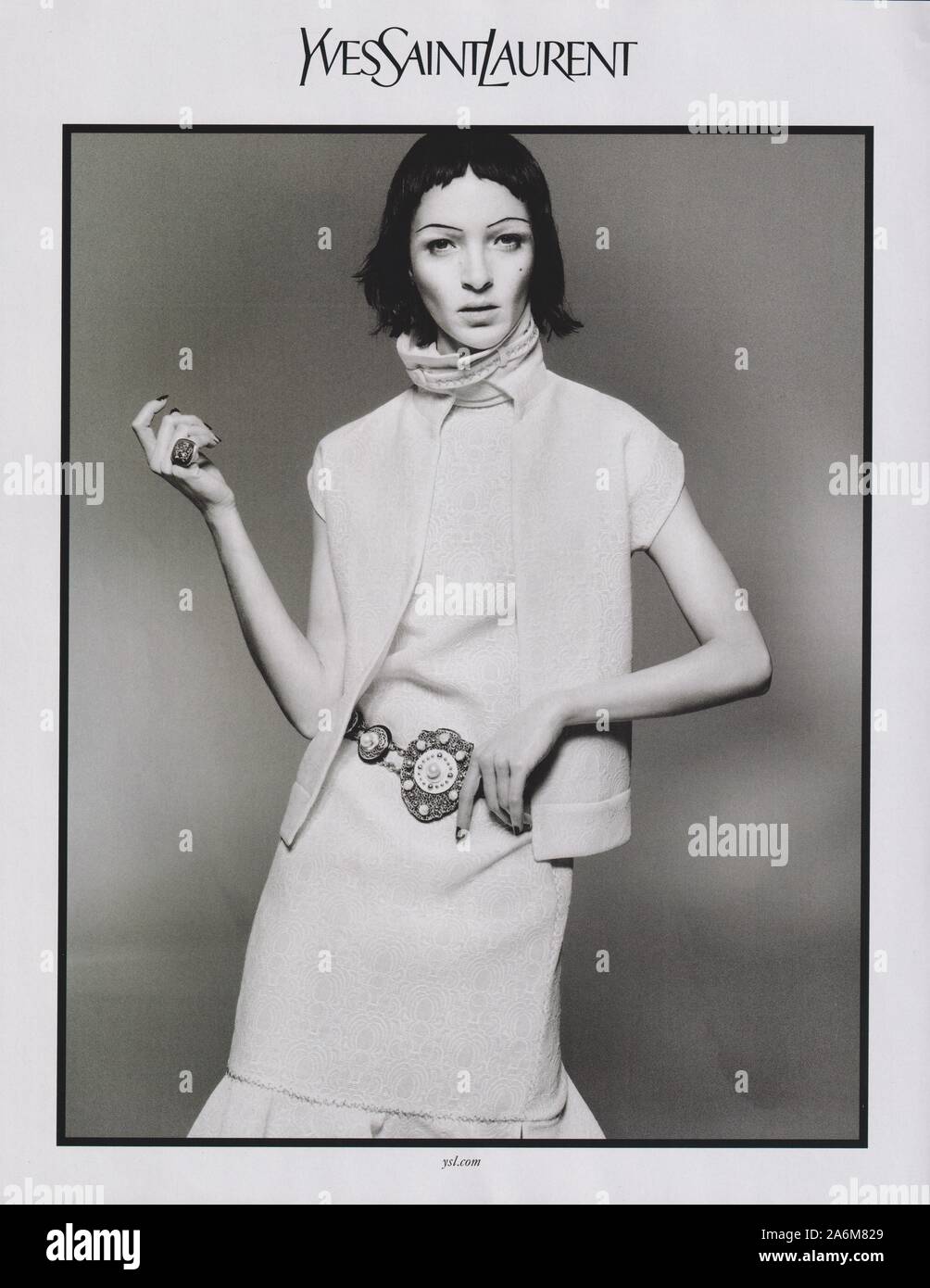 poster advertising Yves Saint Laurent fashion house with Mariacarla ...