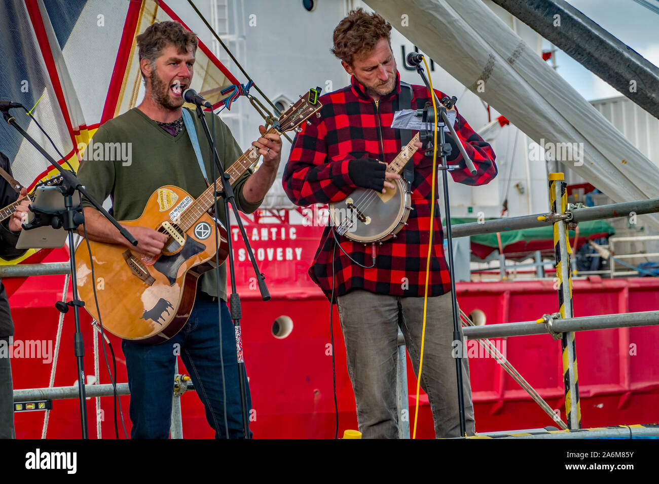 Male vocal group performing in front of a small crowd at the annual ...