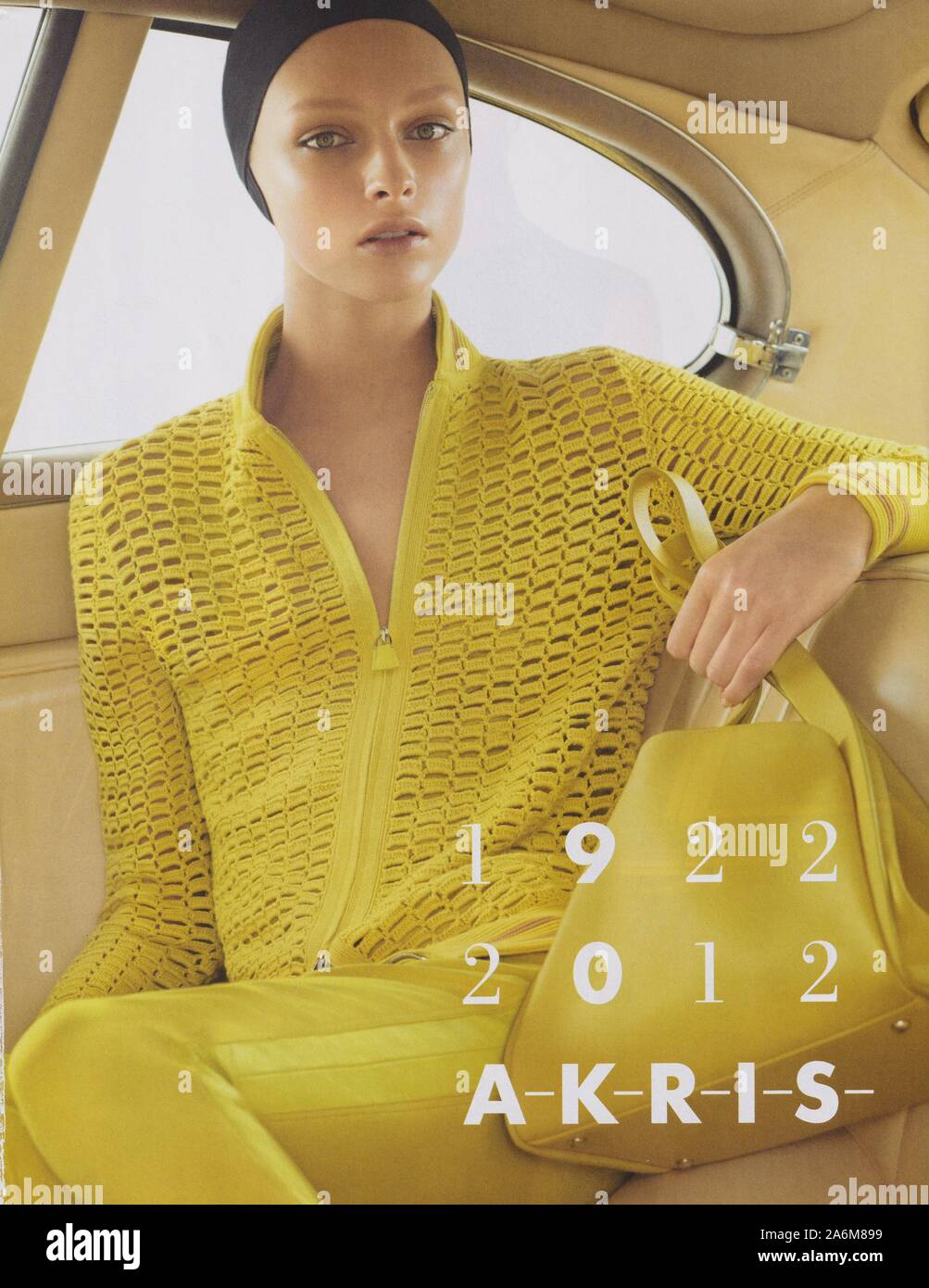 poster advertising Akris fashion house with Daga Ziober in paper ...