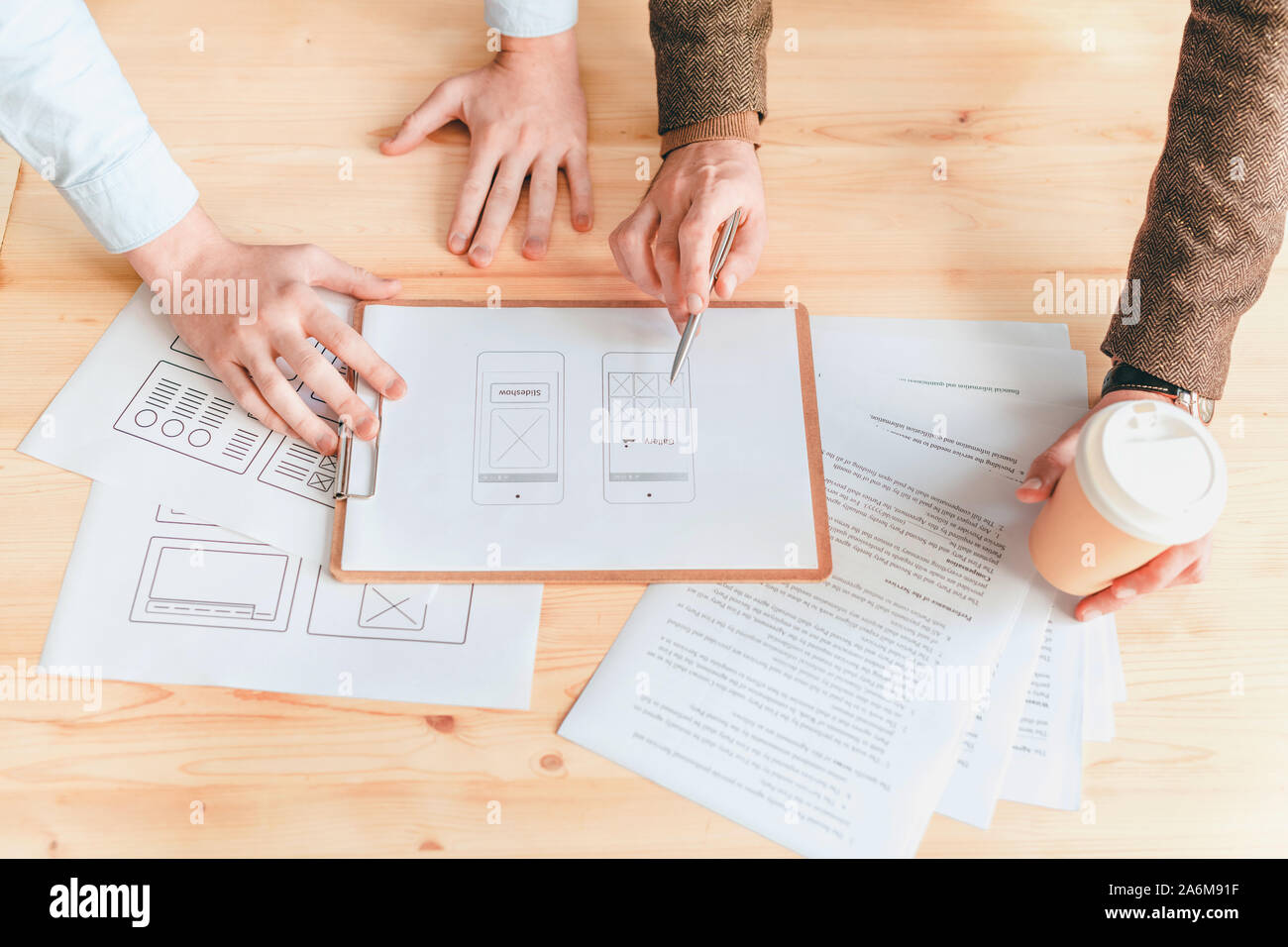 Business people discussing house plan hi-res stock photography and ...