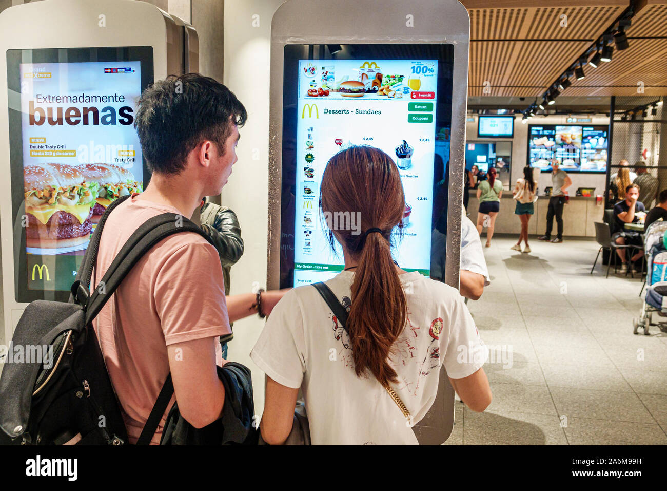 Person ordering food at restaurant hi-res stock photography and images ...