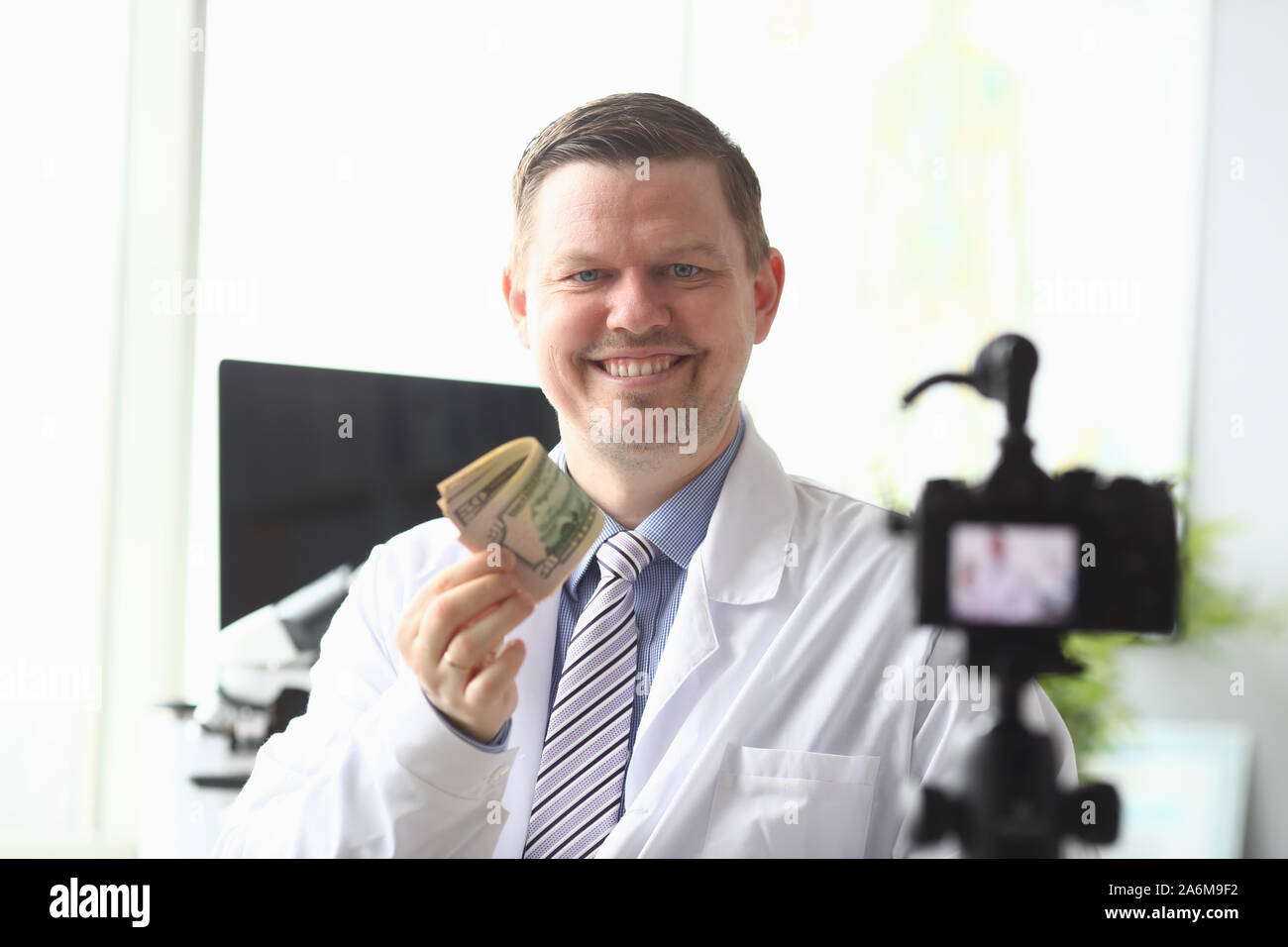 Rich male physician Stock Photo - Alamy