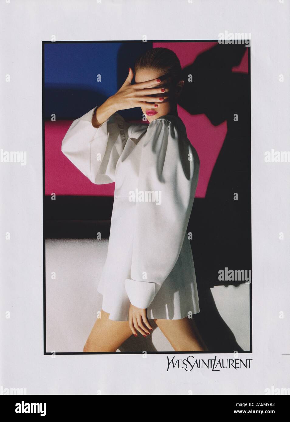 poster advertising Yves Saint Laurent fashion house with Natalia ...