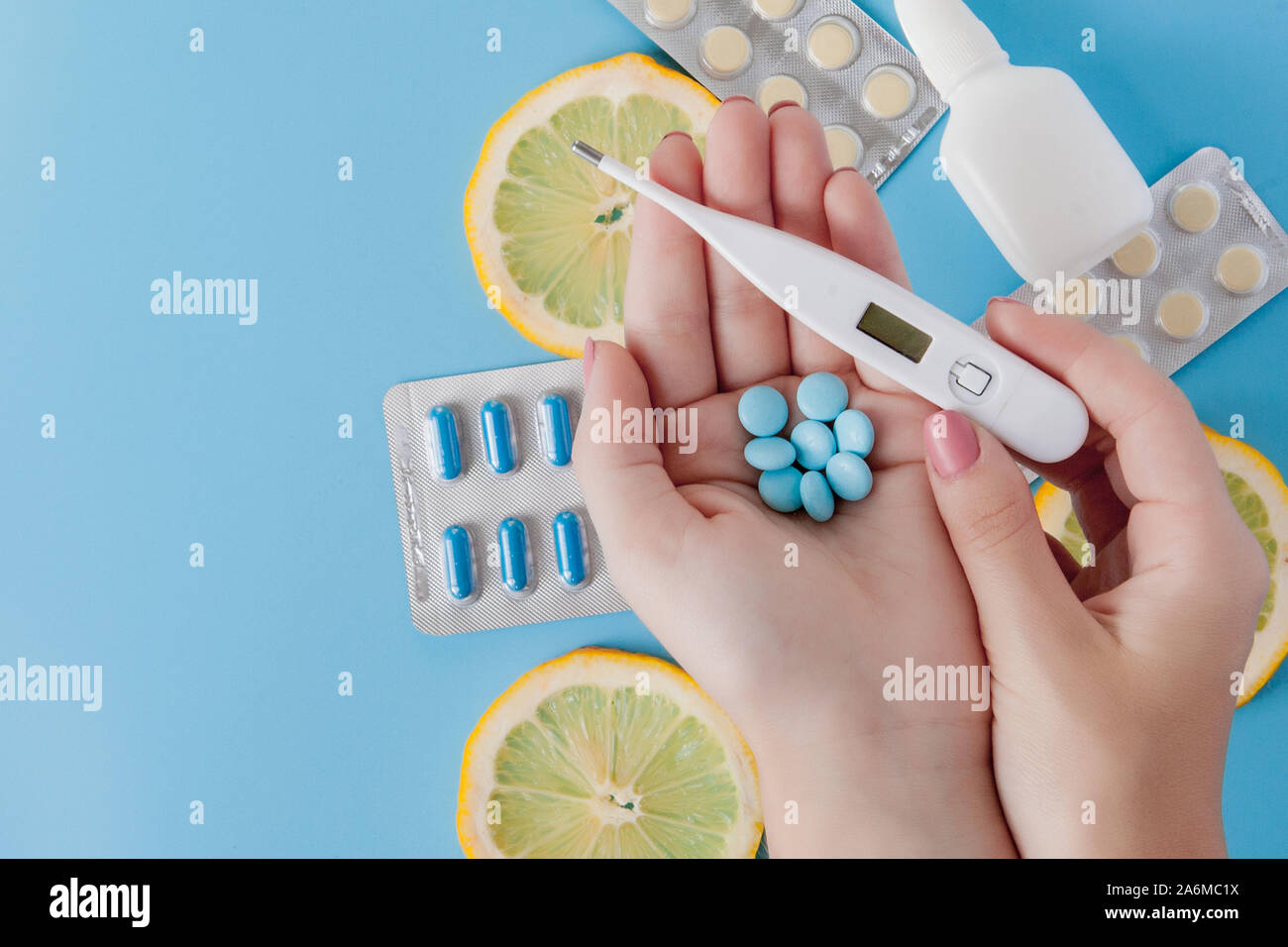 Medications, pills, thermometer, traditional medicine for treating ...