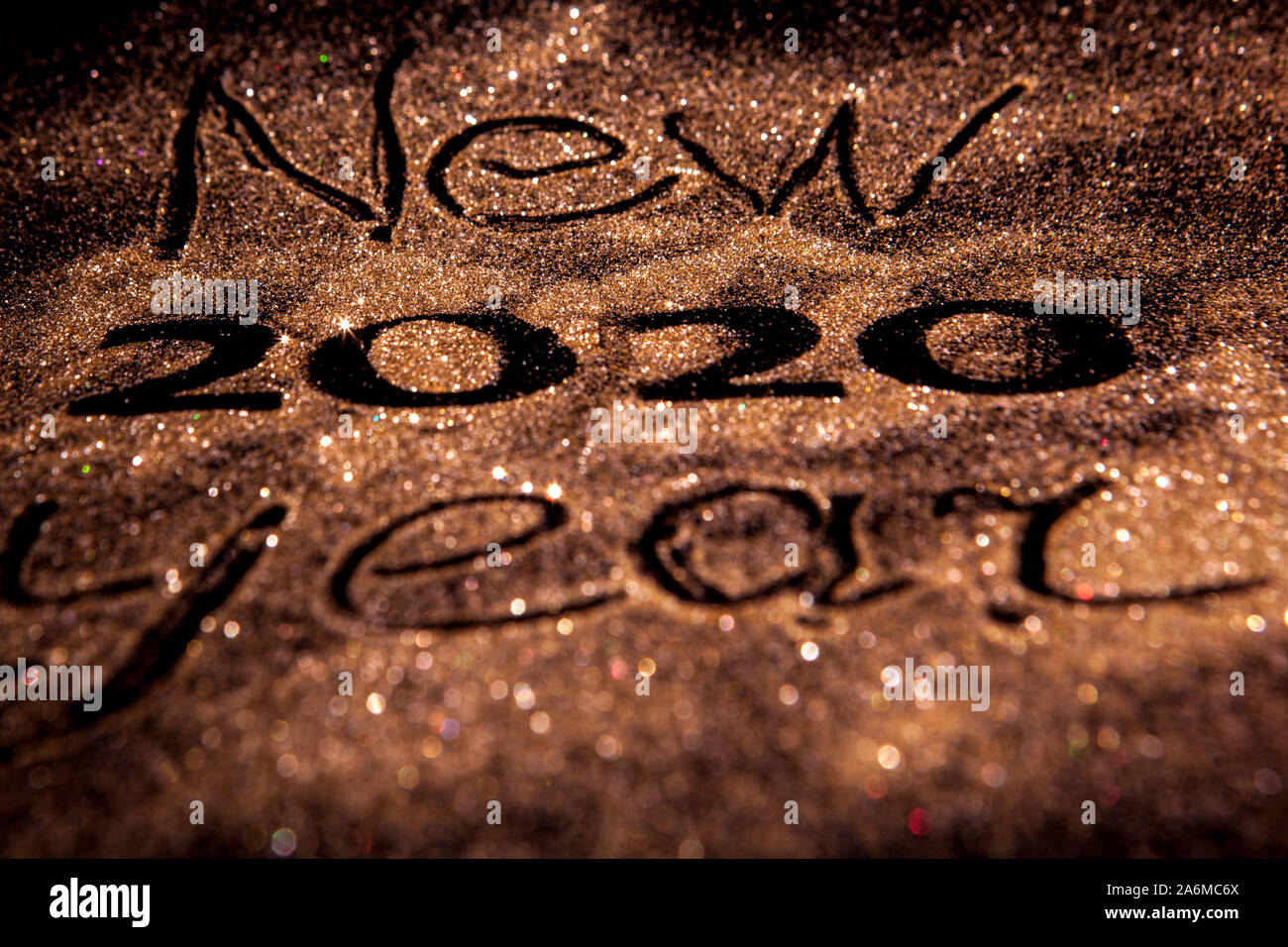 Happy New Year 2020. Beautiful sparkling Golden number 2020 on black ...