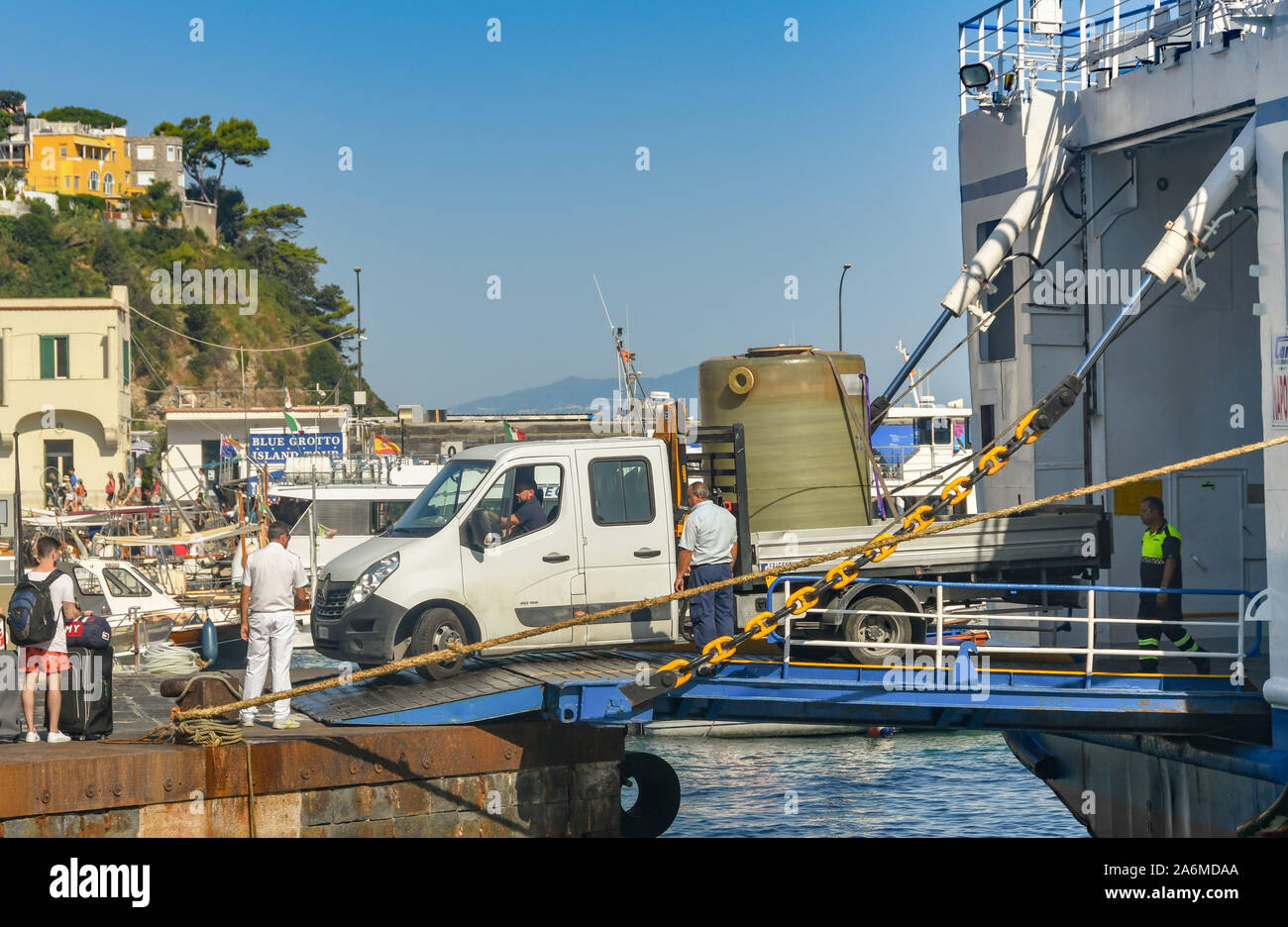 ISLE OF CAPRI, ITALY - AUGUST 2019: Truck with a large container on the ...