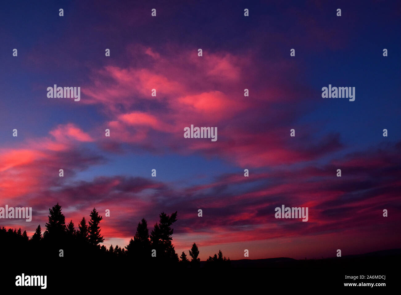 Stunning deep purple sunset Stock Photo - Alamy