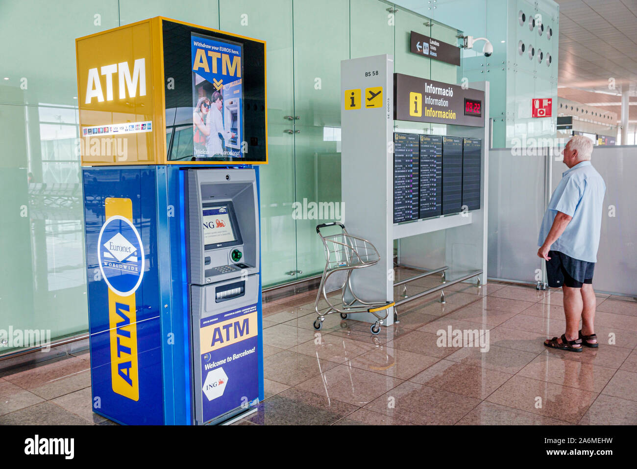 Man looking at information board hi-res stock photography and images ...