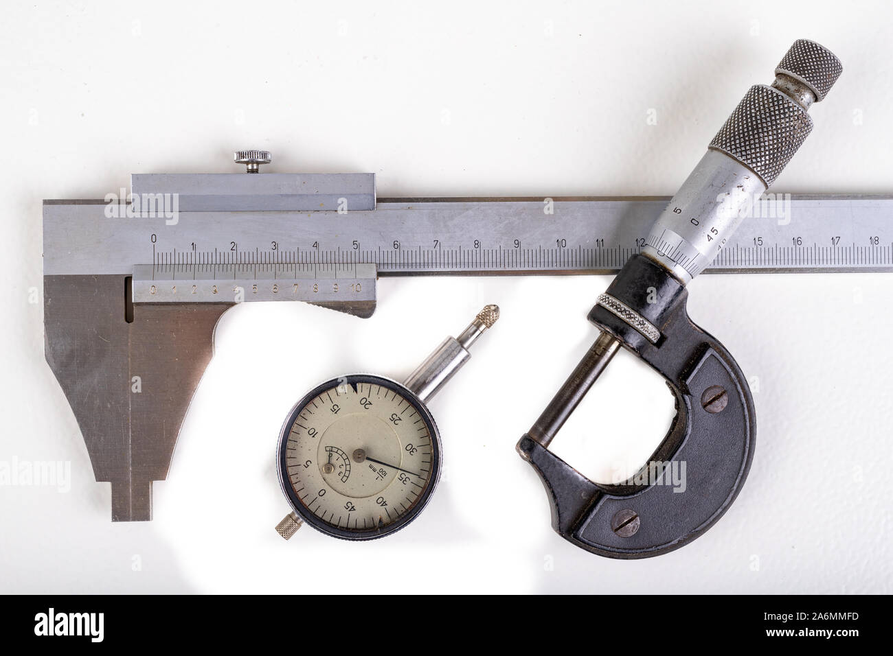 Caliper, micrometer and sensor. Measuring tools used in the workshop ...