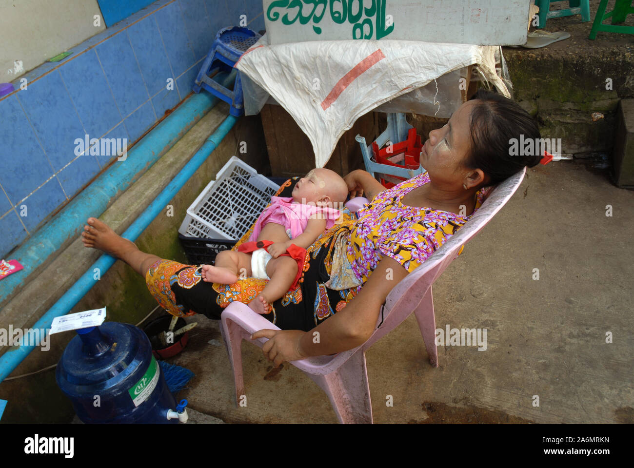 Sleeping woman and baby, Yangon, Myanmar, Asia Stock Photo - Alamy