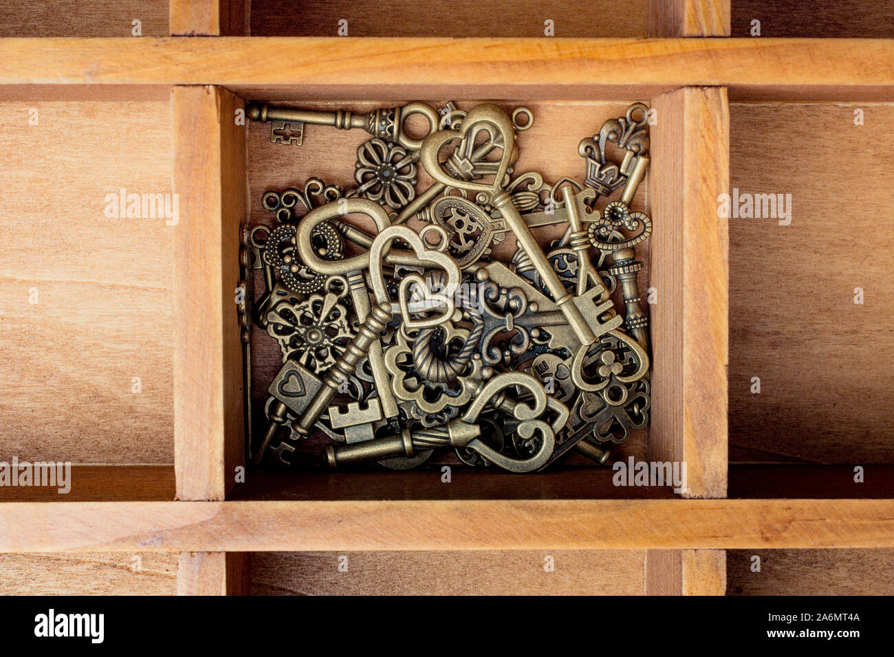 Retro style metal keys in a wooden box Stock Photo - Alamy