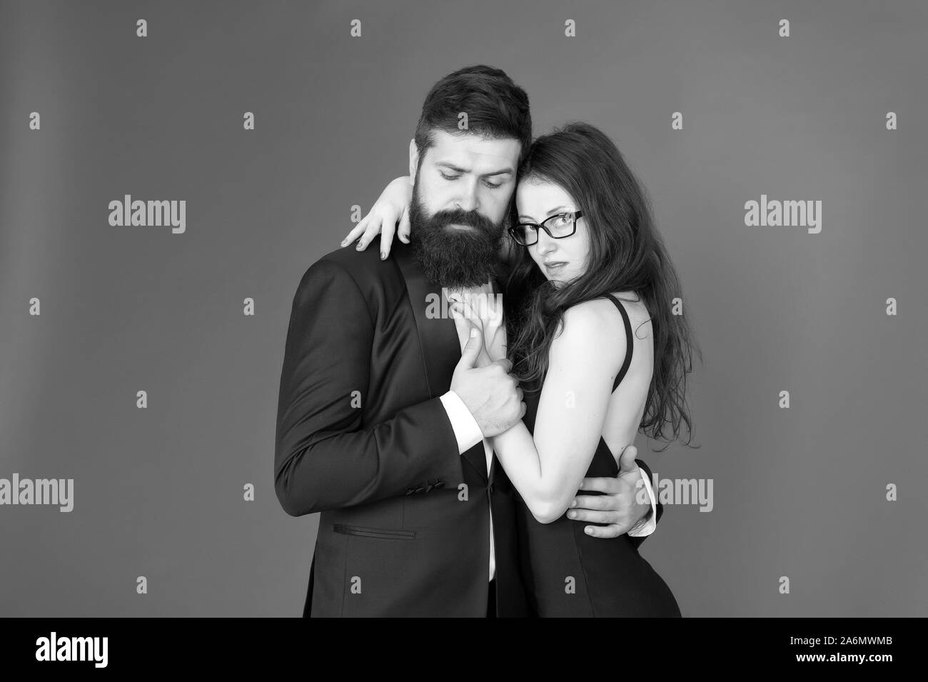 Feel rhythm of heart. Happy together. Man in tuxedo and woman black ...