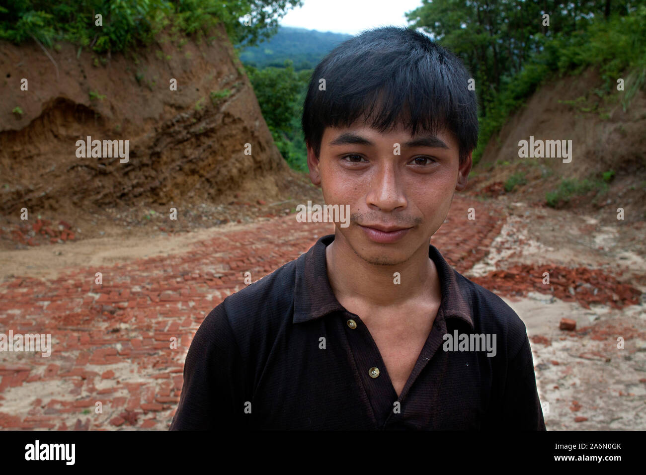 A young man from the ethnic Murong community who works as a tourist ...