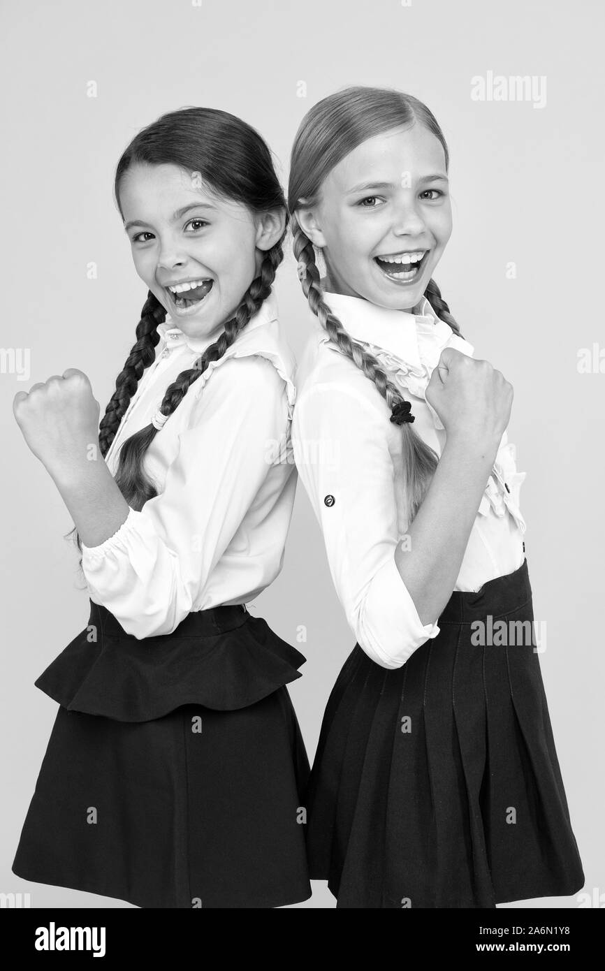 Best pupils award. Excellent pupils. Girls perfect uniform outfit on ...