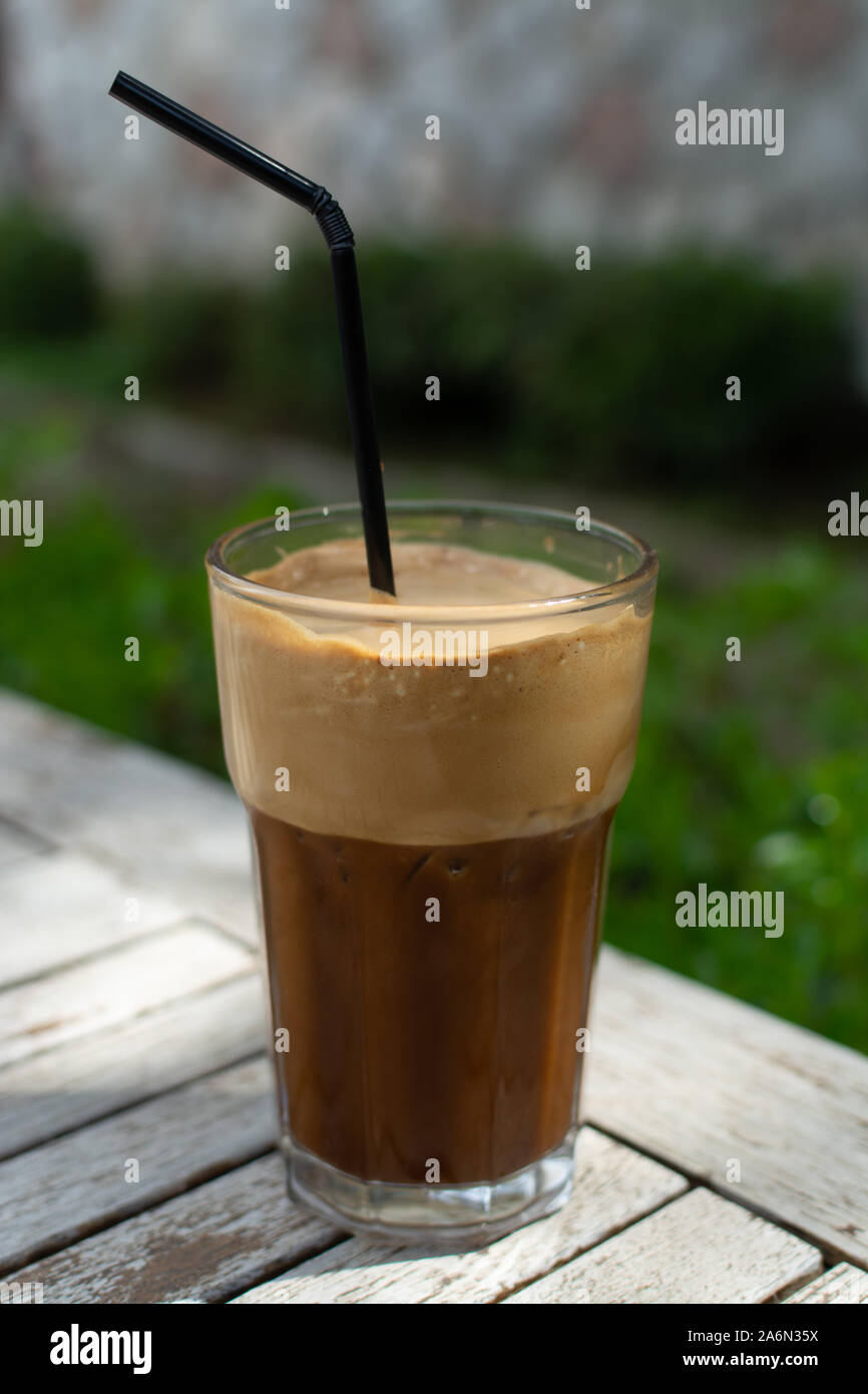 Traditional greek cold coffee Frappe with foam made from water, instant ...