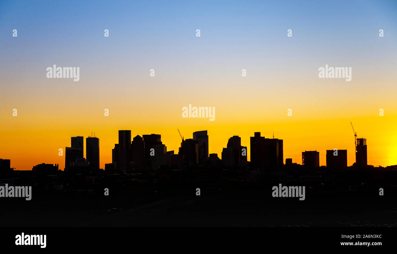 Sunset over skyscrapers on the modern downtown Boston skyline ...