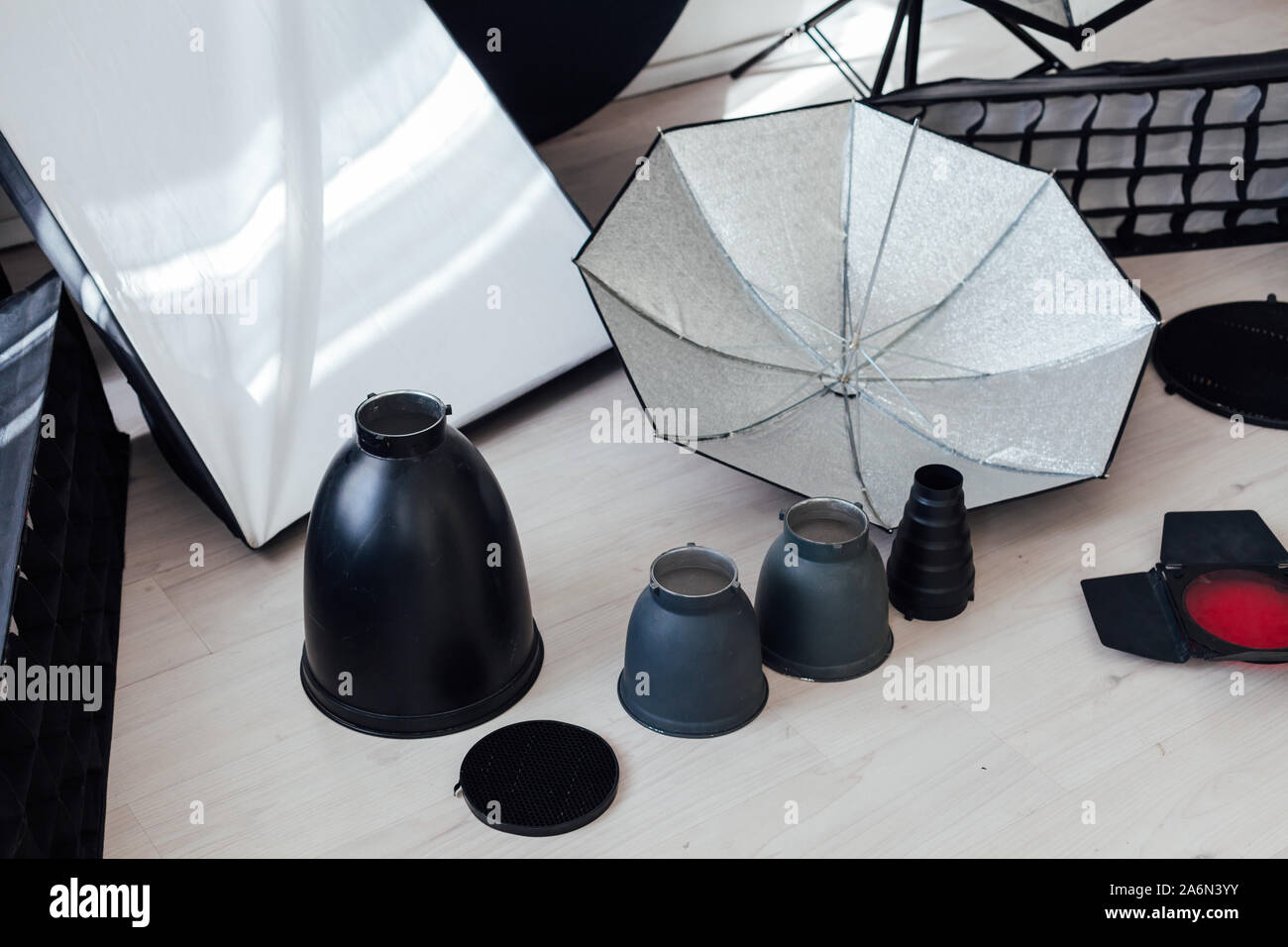 Photo studio equipment flash accessories photographer on background ...