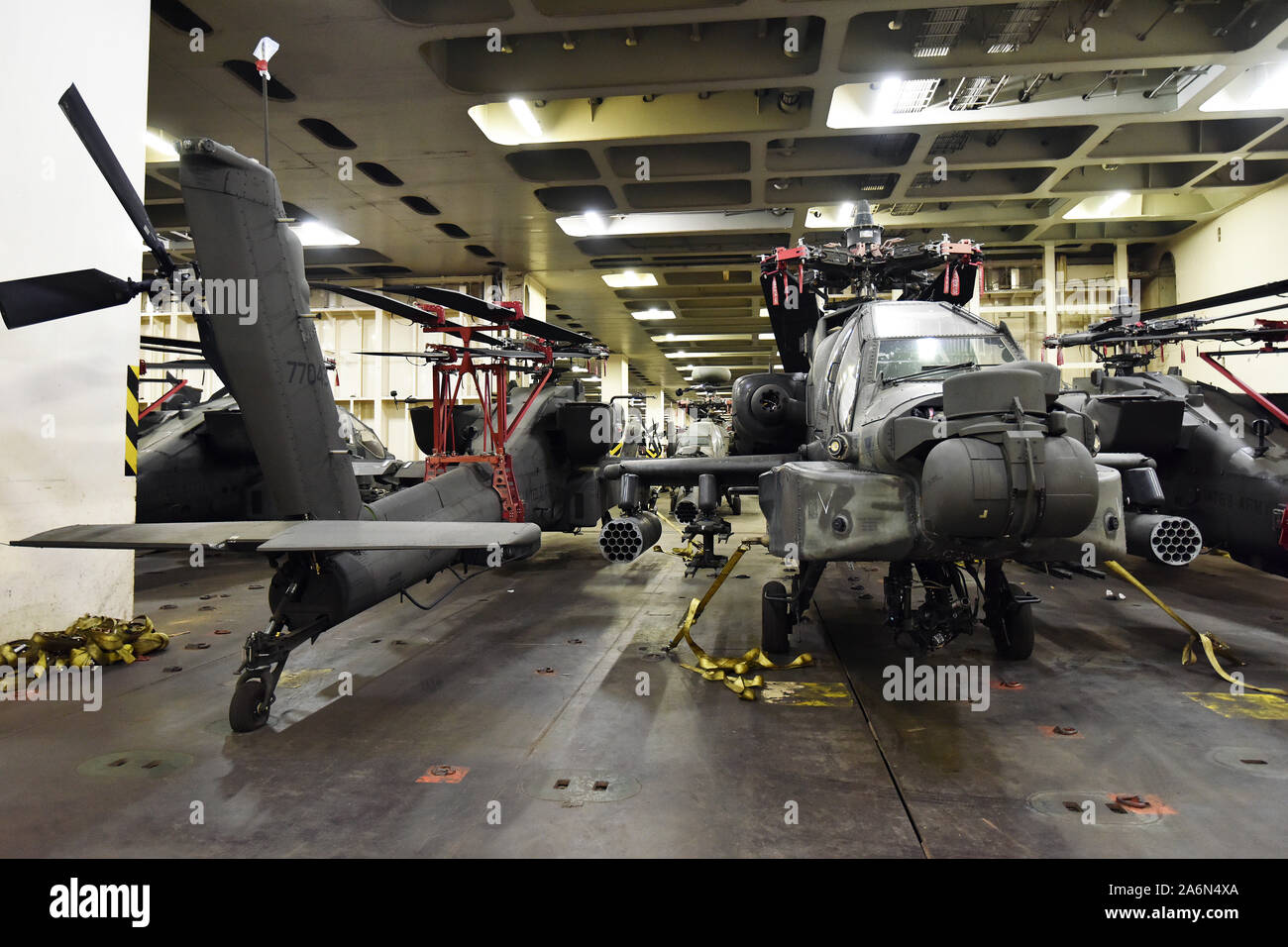 U.S. Army AH-64 Apache helicopters loaded inside the cargo vessel, ARC ...