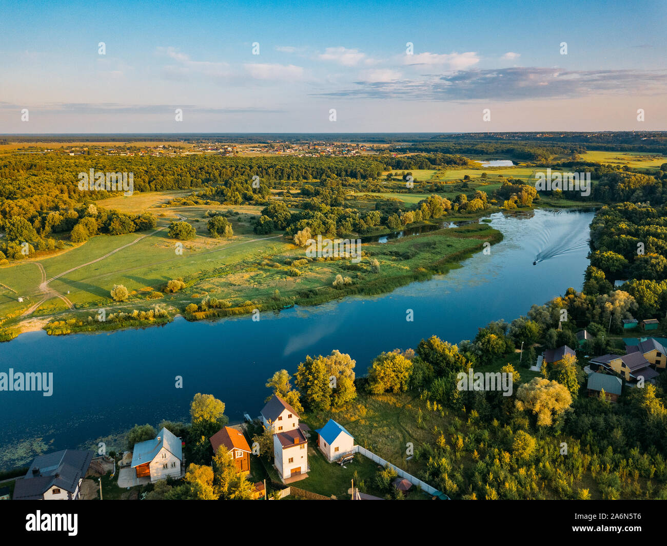 Summer rural landscape, aerial view. Village, forest and river from ...