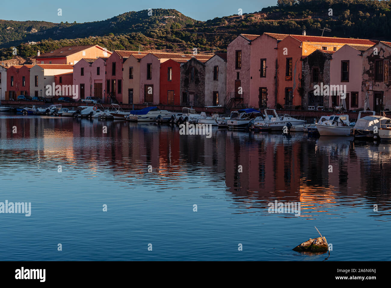 BOSA, ITALY / OCTOBER 2019: Life in the colorful fishermen's village in ...