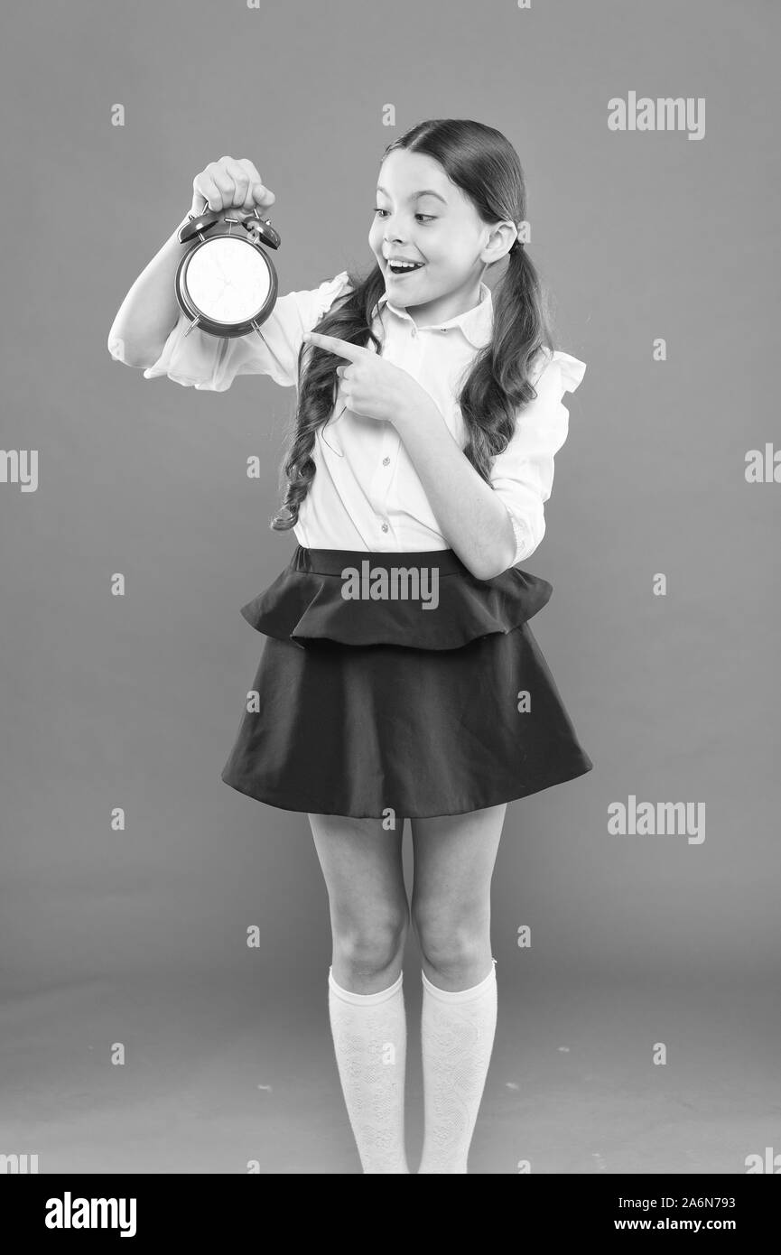 Discipline and time. daily routine schedule. schoolgirl retro alarm ...