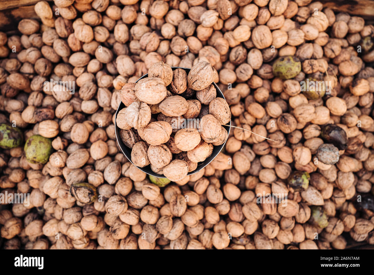 A basket full of fresh raw walnuts fruits Stock Photo - Alamy