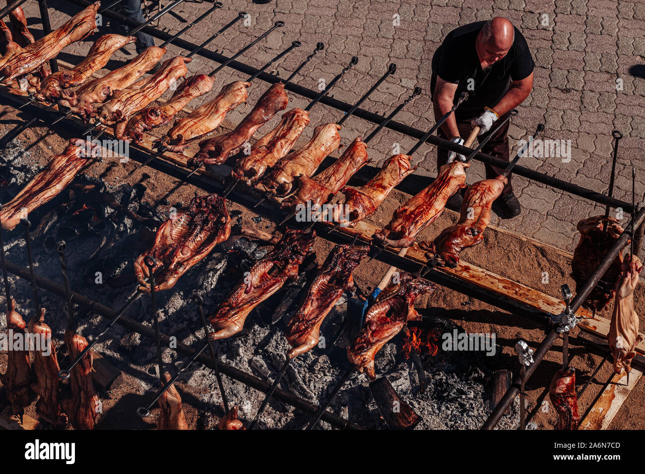 ORGOSOLO, SARDINIA /OCTOBER 2019: The old tradition of cooking the ...