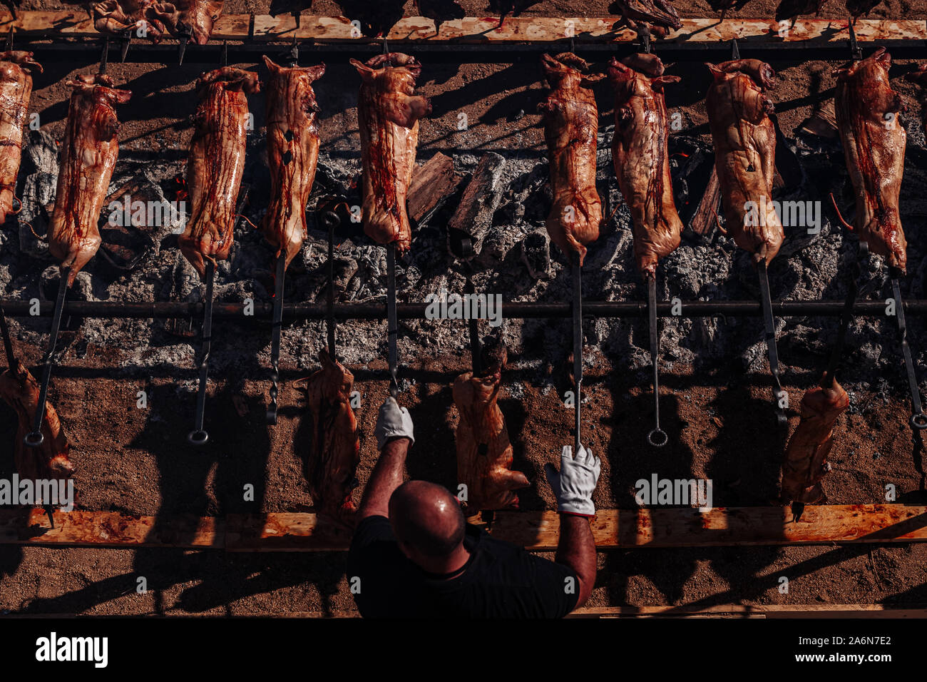 ORGOSOLO, SARDINIA /OCTOBER 2019: The old tradition of cooking the ...
