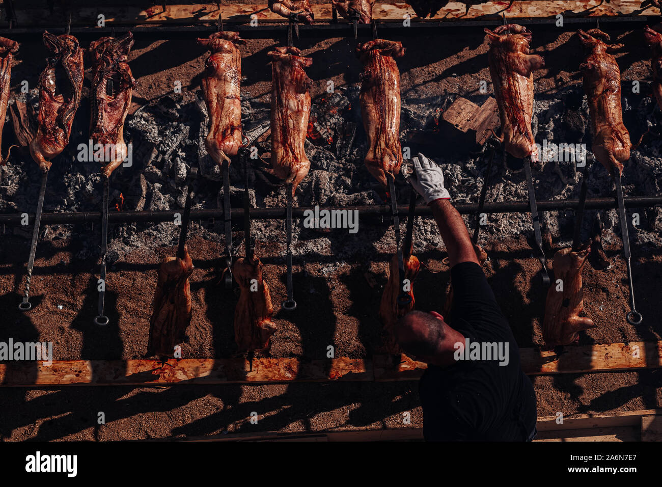 ORGOSOLO, SARDINIA /OCTOBER 2019: The old tradition of cooking the ...