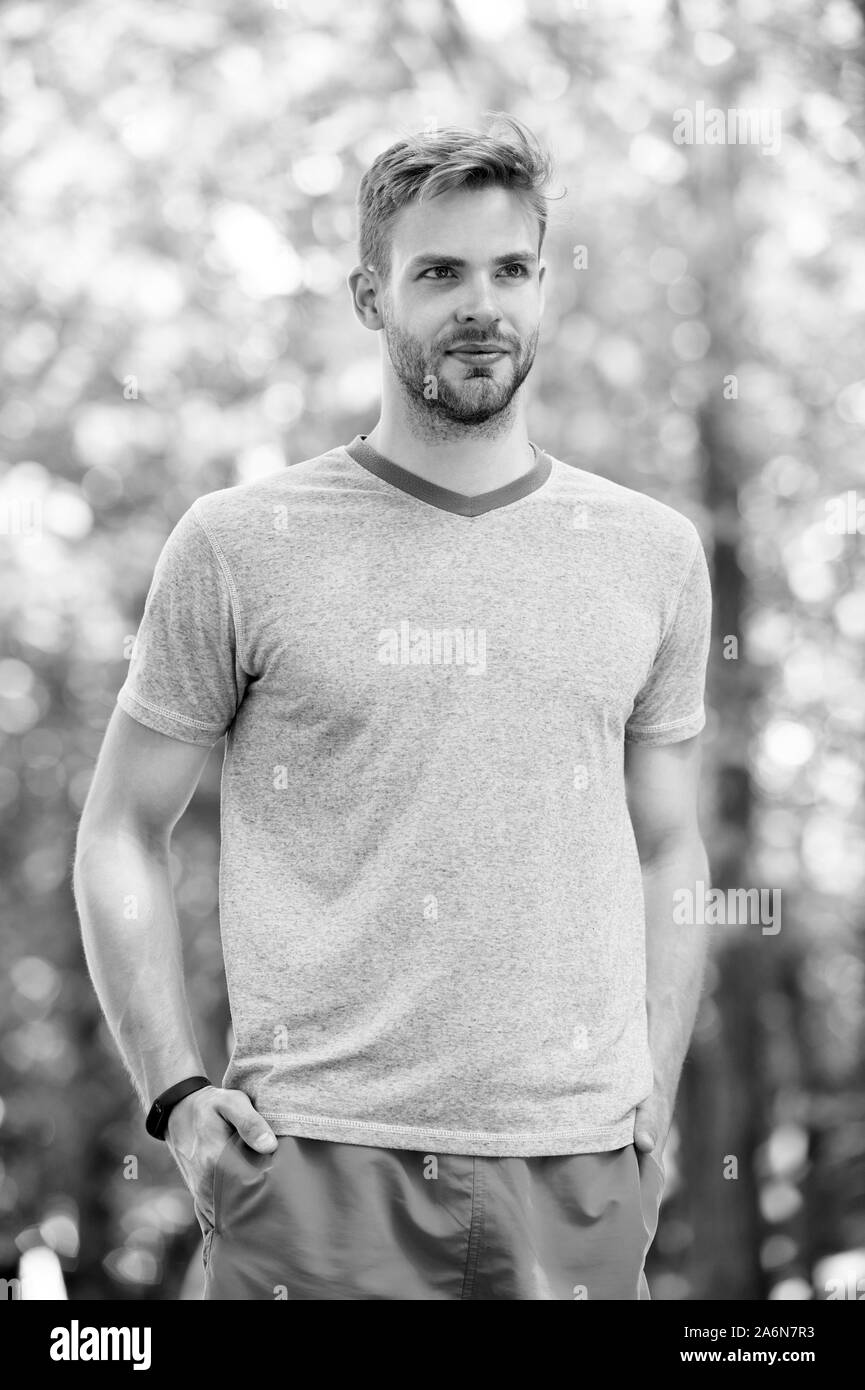 Sport is way of life. Sportsman lifestyle. Handsome athlete in park ...
