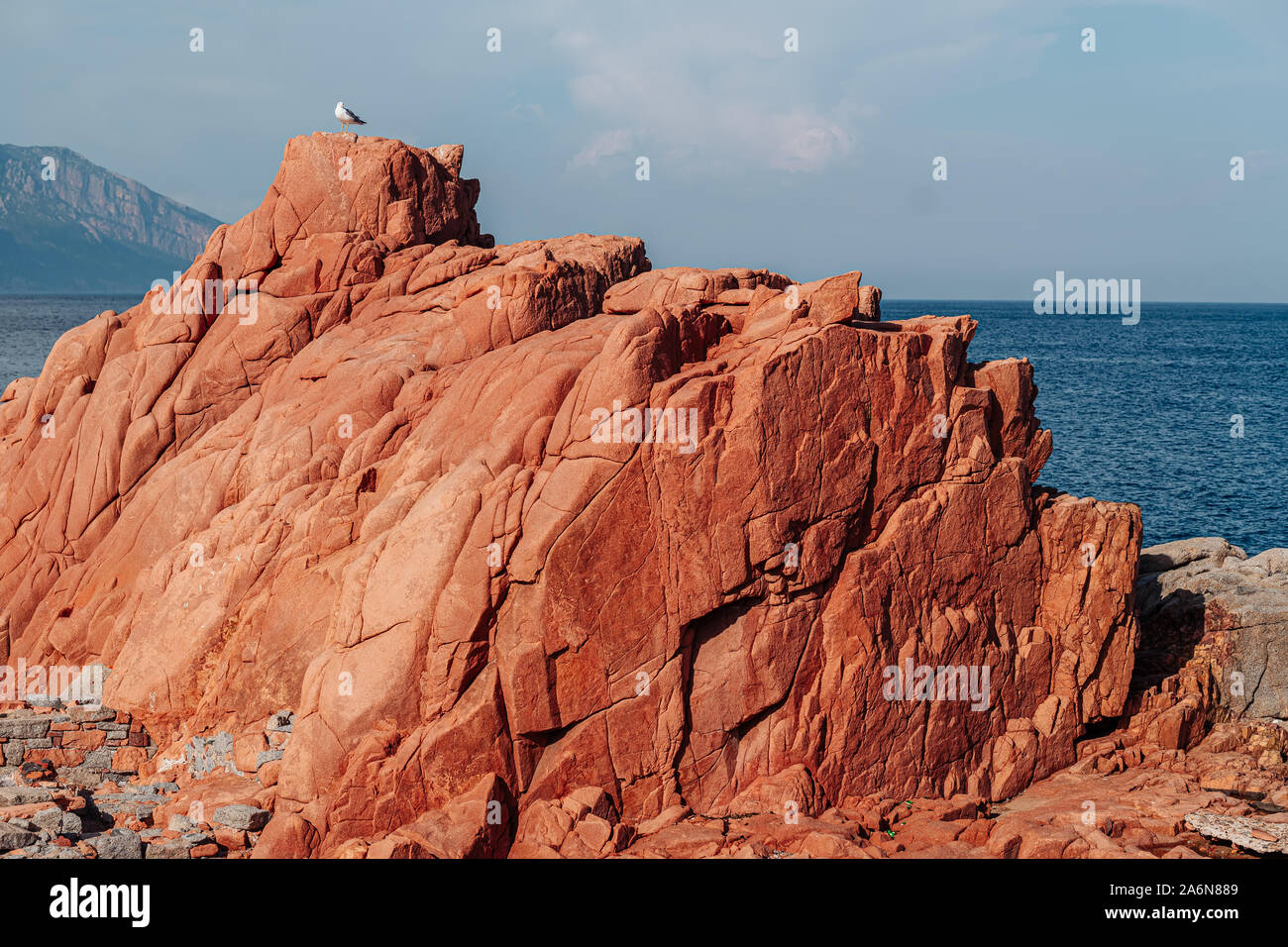 ARBATAX, ITALY / OCTOBER 2019: The scenic red rocks beach in Sardinia ...