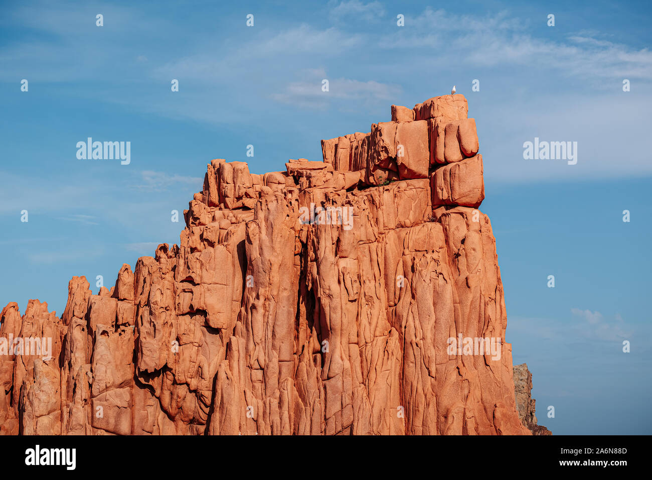 ARBATAX, ITALY / OCTOBER 2019: The scenic red rocks beach in Sardinia ...