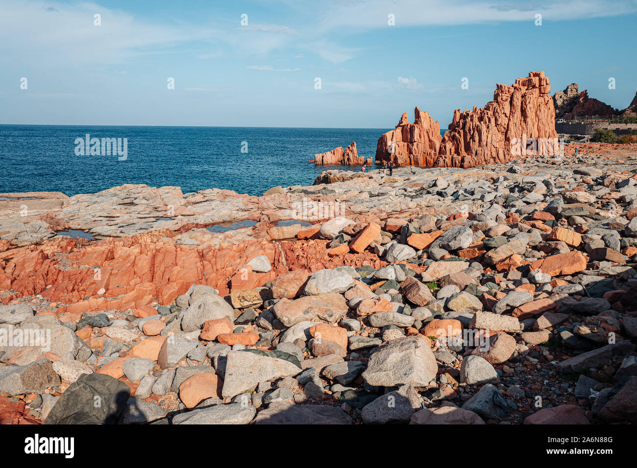 ARBATAX, ITALY / OCTOBER 2019: The scenic red rocks beach in Sardinia ...