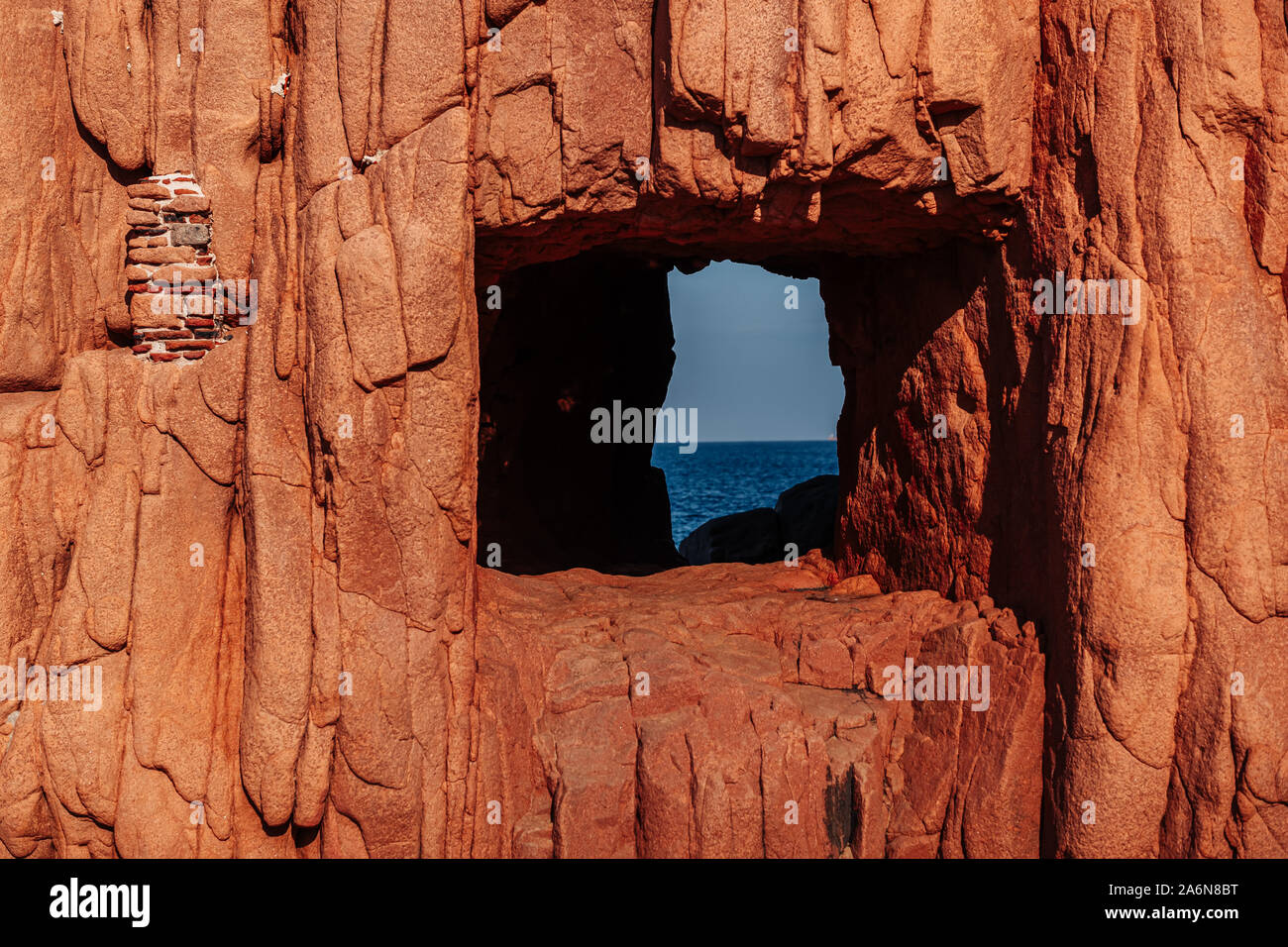 ARBATAX, ITALY / OCTOBER 2019: The scenic red rocks beach in Sardinia ...