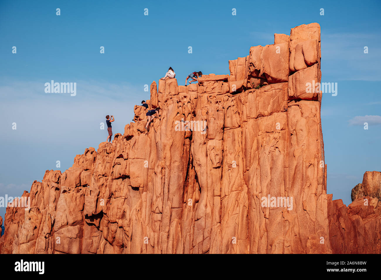 ARBATAX, ITALY / OCTOBER 2019: The scenic red rocks beach in Sardinia ...