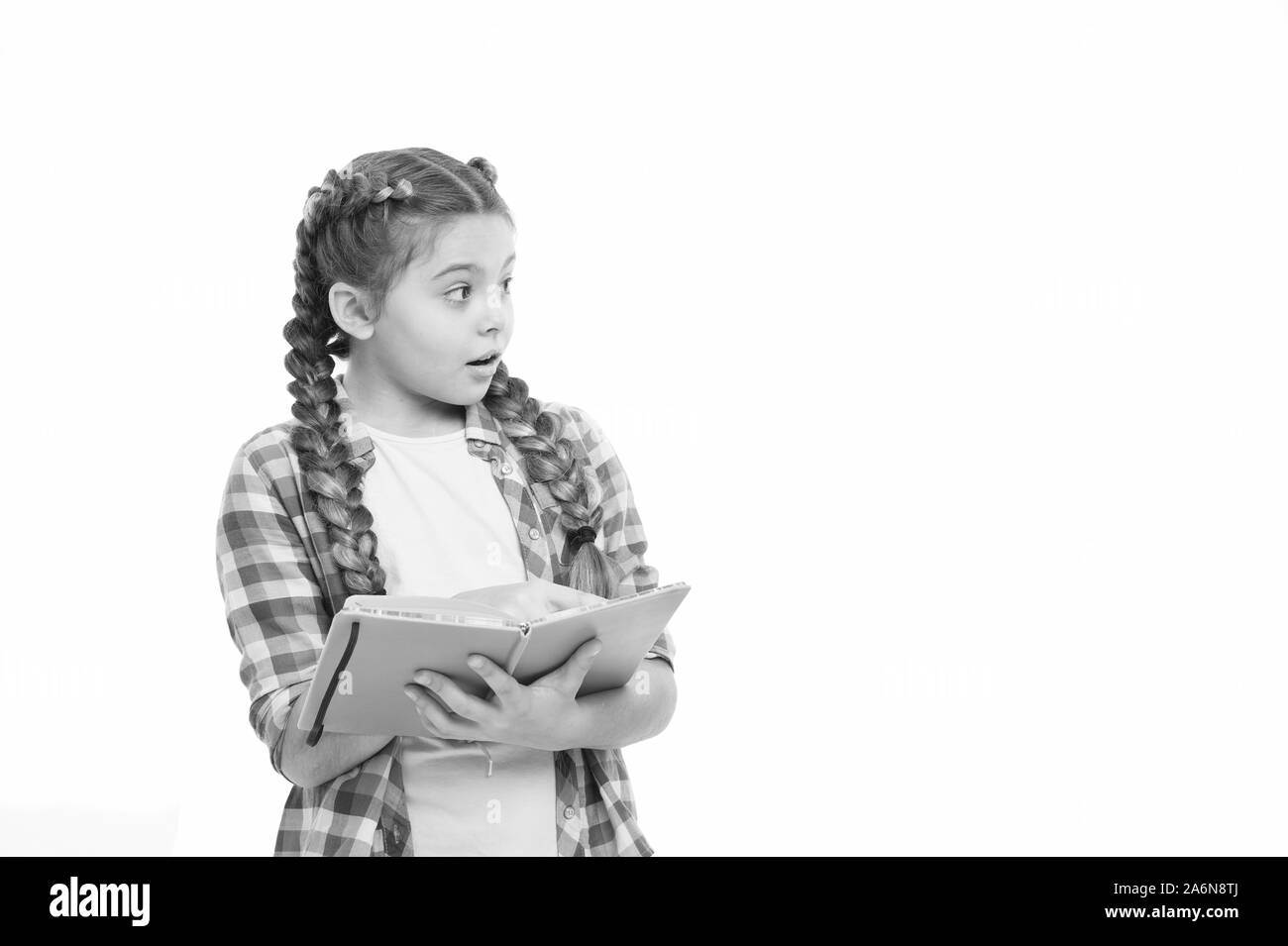 reading interesting story. pupil with work book. back to school ...