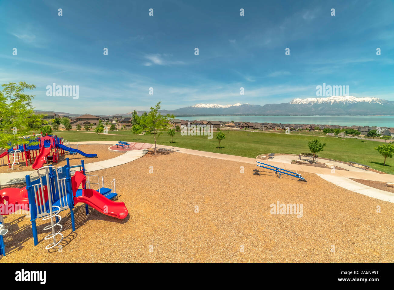 Lake and snow capped mountain viewed fron a park with colorful ...