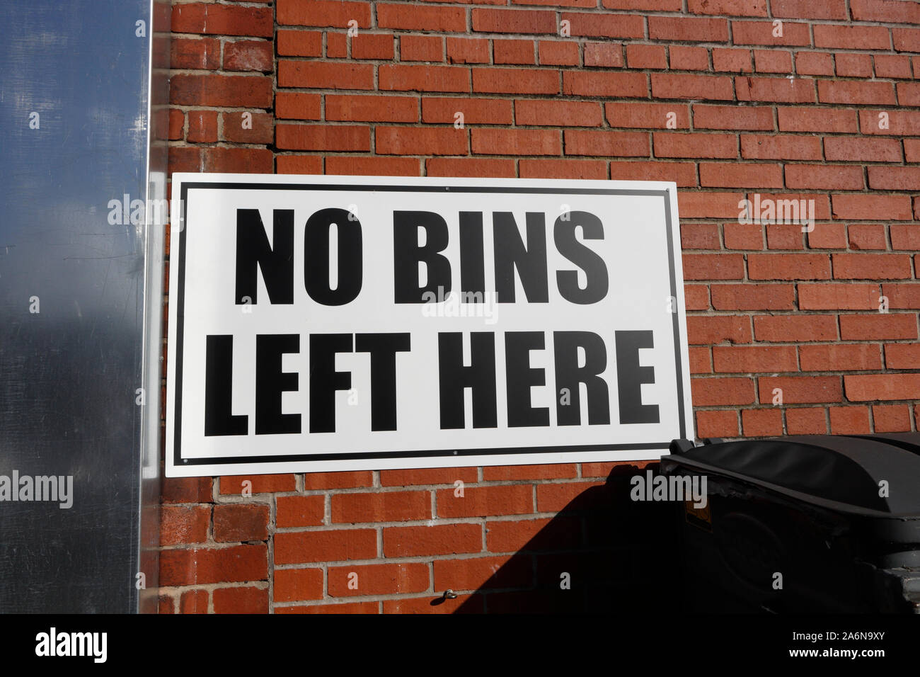 No bins left here, sign on brick wall, Sheffield UK Stock Photo - Alamy