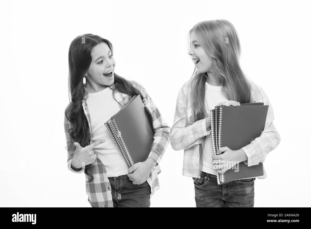 Happy to be students. Girls with school textbooks white background ...