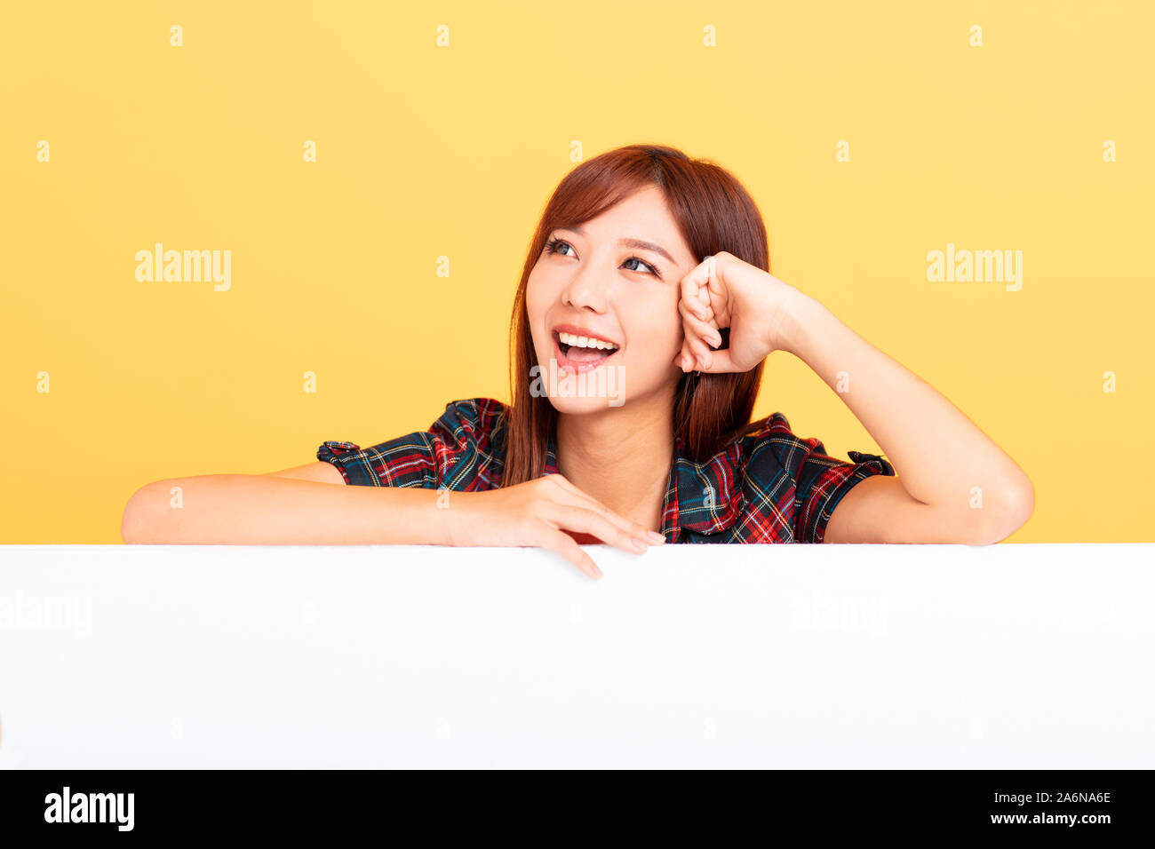 Young Asian woman holding blank billboard for advertising signs Stock ...